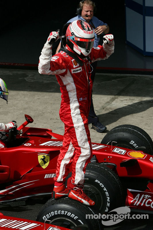 Race winner and 2007 World Champion Kimi Raikkonen celebrates at ...